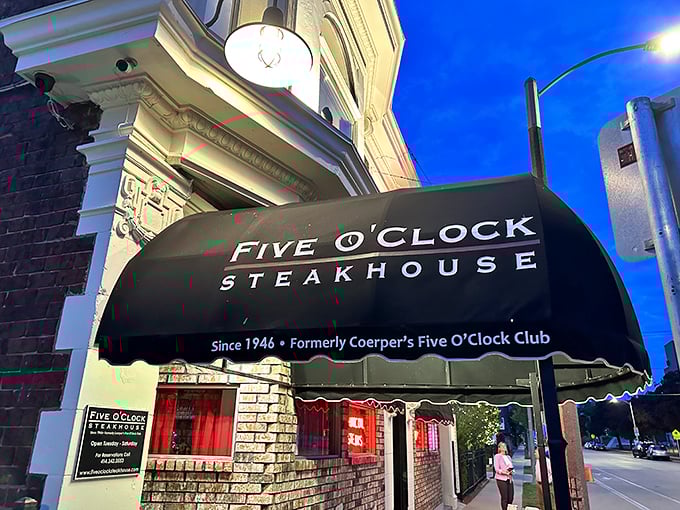 The iconic black awning against Milwaukee's evening sky announces you've arrived somewhere special—a steakhouse that's been perfecting its craft since 1946.