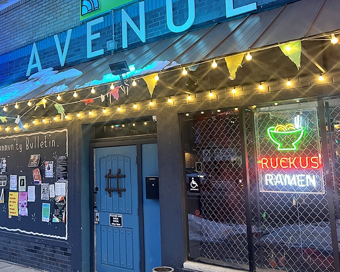 That blue door isn't just an entrance—it's a portal to noodle nirvana, complete with festive lights that say "yes, we're serious about fun AND food."