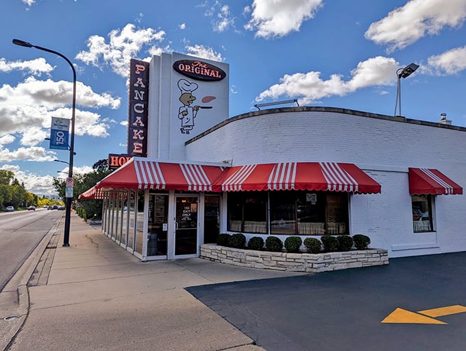 That iconic white building with red-and-white awnings isn't just a restaurant—it's a morning landmark that's been beckoning hungry North Shore residents for generations.
