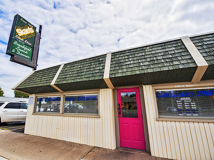 Under the moonlight, Skaets transforms into a neon-lit temple of comfort food. That red roof has sheltered generations of happy, gravy-filled bellies.