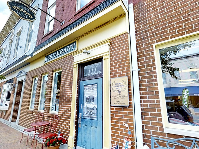 The brick façade and blue door of Liberty Gathering Place practically say, “come on in”—like a small-town welcome committee that knows its way around a good meal.