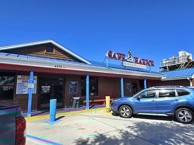 A humble exterior that seafood aficionados recognize as the telltale sign of authenticity. The blue pillars and wooden facade say "focus on the food, not the frills."