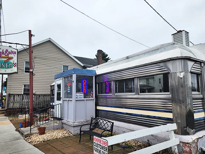 Another angle reveals the diner's vintage charm, complete with the iconic neon sign that's been beckoning hungry travelers for generations.