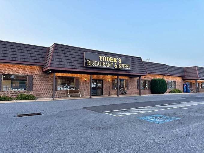 The unassuming exterior of Yoder's Restaurant & Buffet stands like a culinary lighthouse in New Holland, beckoning hungry travelers with promises of Pennsylvania Dutch comfort.