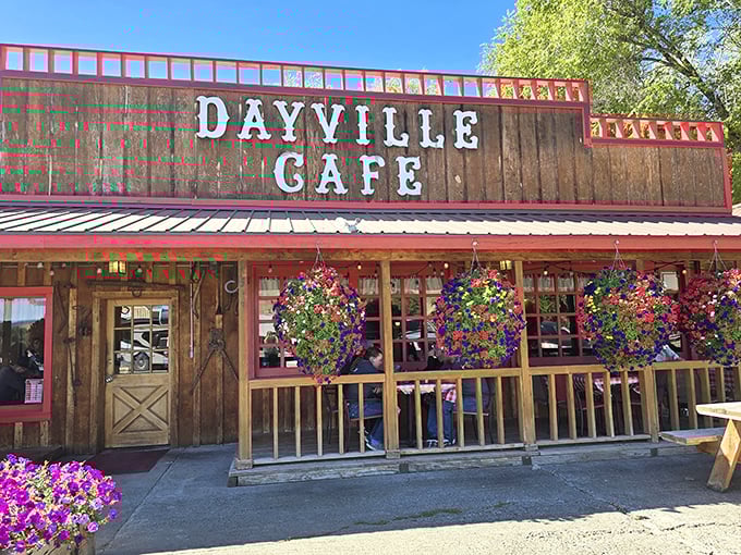 1. the burgers at this restaurant in oregon are so good, they have a cult The Dayville Cafe stands proud against the Oregon sky, its rustic wooden facade and vibrant hanging flower baskets beckoning hungry travelers like a desert oasis.