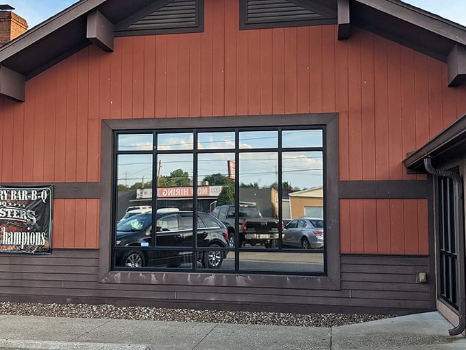 A closer look at the restaurant's distinctive reddish-brown siding – like the color of a perfect smoke ring on a well-tended brisket.