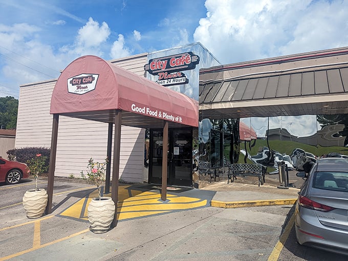 The iconic red awning of City Cafe Diner promises exactly what it delivers: "Good Food & Plenty of It." No false advertising here, folks!