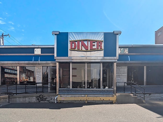 That classic blue facade isn't trying to be retro—it just is. Some architectural decisions are too perfect to need updating.