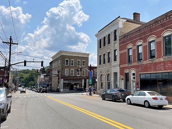 Downtown Fayetteville greets visitors with historic charm and mountain views, where brick buildings stand like sentinels guarding small-town treasures waiting to be discovered.