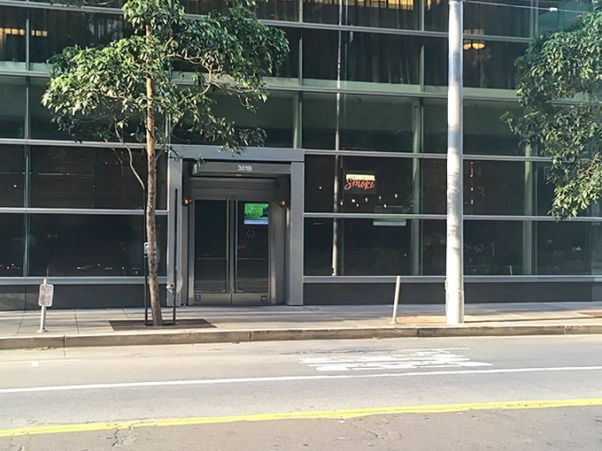The unassuming entrance to International Smoke beckons from the street, promising smoky delights within this SOMA district gem.