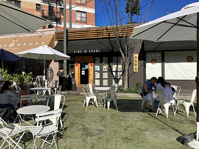Pine & Crane's outdoor seating area offers a sun-dappled urban oasis where you can savor those legendary dan dan noodles al fresco. The perfect Silver Lake afternoon awaits.