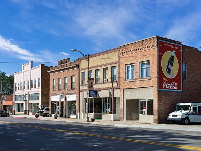 Main Street Helper looks like a movie set where John Wayne might stroll by for a sarsaparilla. Those vintage brick facades tell stories older than your favorite jeans.
