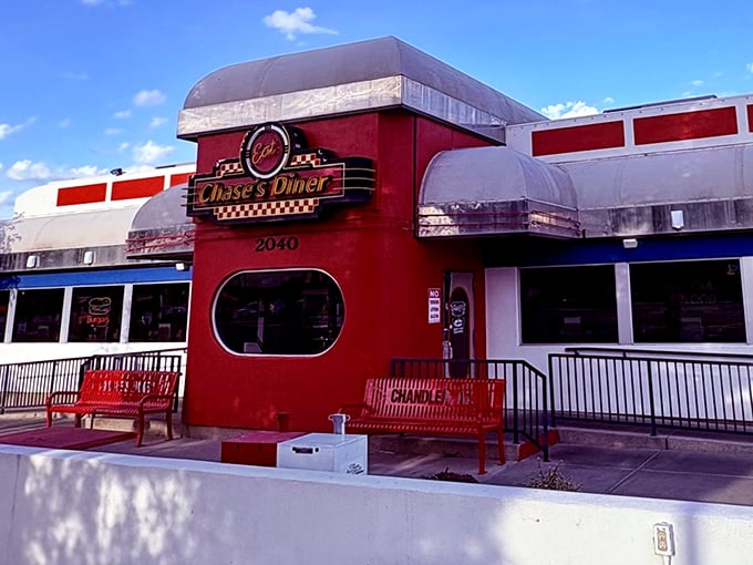The classic red and white exterior of Chase's Diner stands out like a beacon of breakfast hope on Chandler Boulevard.