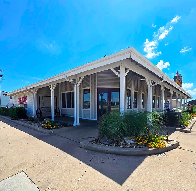 The unassuming exterior of Prairie Kitchen stands like a beacon of comfort food hope against Oklahoma's endless blue sky.