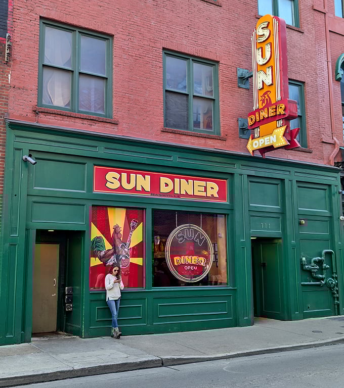 That green storefront and vintage neon sign are like a beacon calling you home to breakfast paradise.