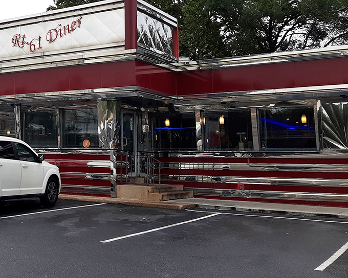 The classic stainless steel exterior of Route 61 Diner gleams like a time machine to the golden age of American roadside dining.