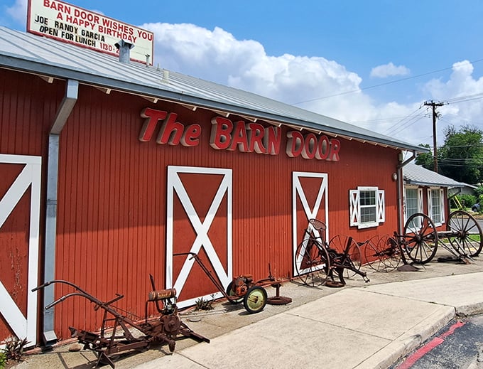 That red barn exterior isn't just for show – it's a promise of honest-to-goodness Texas steakhouse tradition waiting inside.