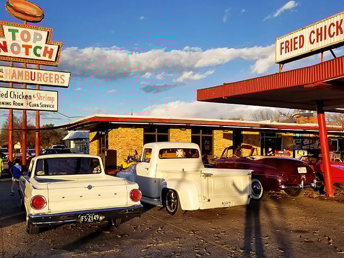 That iconic roadside sign and vintage drive-in canopy will make you slow down faster than spotting a speed trap.