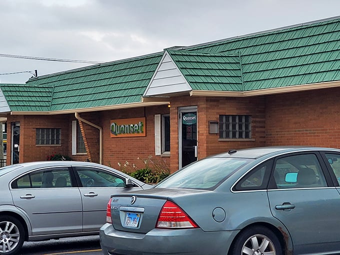 The distinctive green-roofed Quonset hut isn't trying to win architectural awards—it's too busy perfecting what's inside. A Waukegan landmark that promises comfort over pretension.