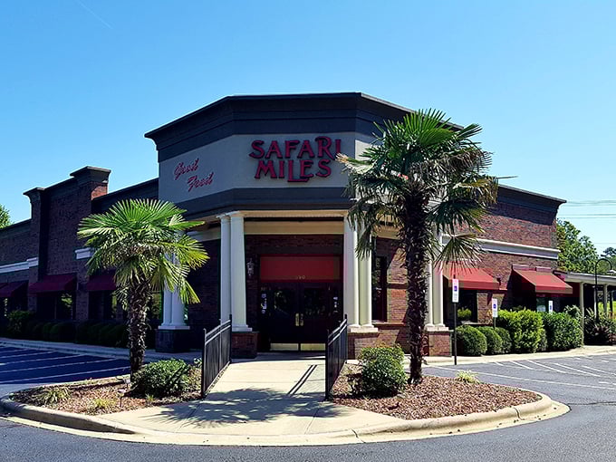 The safari begins at this unassuming corner of Denver, NC, where palm trees and brick create an unexpected oasis for hungry explorers.
