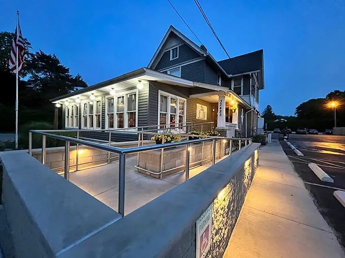 Jake's On Lake transforms into a welcoming beacon at dusk, its illuminated porch practically whispering "come hungry, leave happy" to passersby.