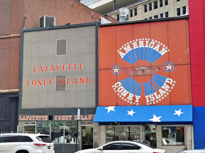 Detroit's culinary cold war continues – Lafayette and American Coney Island share a wall but divided loyalties among hot dog aficionados for generations. Choose your side wisely!