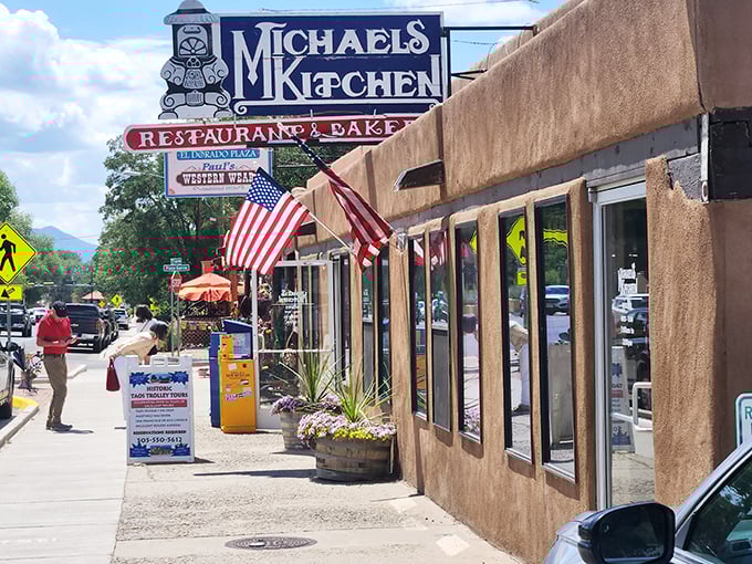 The classic adobe exterior of Michael's Kitchen stands as a beacon of comfort food in Taos, promising culinary treasures within those earthen walls.