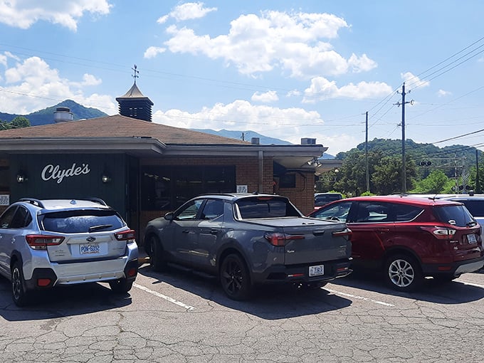 Nestled against the backdrop of North Carolina's mountains, Clyde's parking lot tells the first chapter of its popularity story – finding a spot might be your meal's biggest challenge.