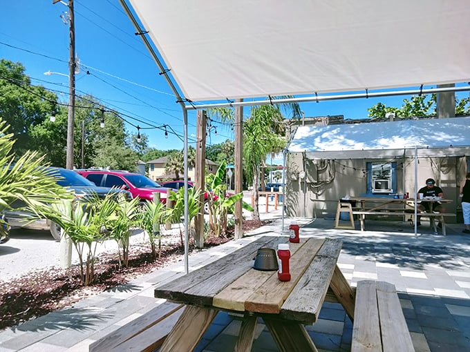 The unassuming exterior of Big Ray's Fish Camp proves that culinary treasures often hide in plain sight. That blue marlin mural is your first clue to seafood greatness.