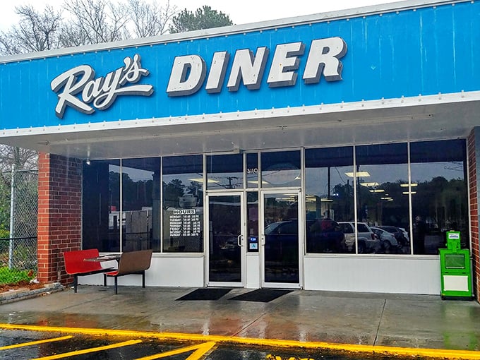 The blue sign beckons like an old friend. Ray's Diner stands unpretentiously on Two Notch Road, promising comfort without fanfare.