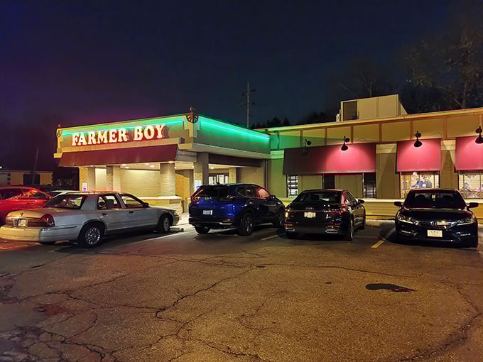 The neon glow of Farmer Boy's sign at dusk isn't just illuminating the parking lot—it's a beacon calling hungry souls home to breakfast paradise.