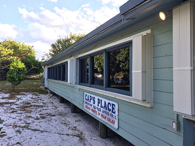 The unassuming seafood sanctuary that's been luring in locals and celebrities alike. Cap's Place's weathered blue exterior hints at the treasures waiting inside.
