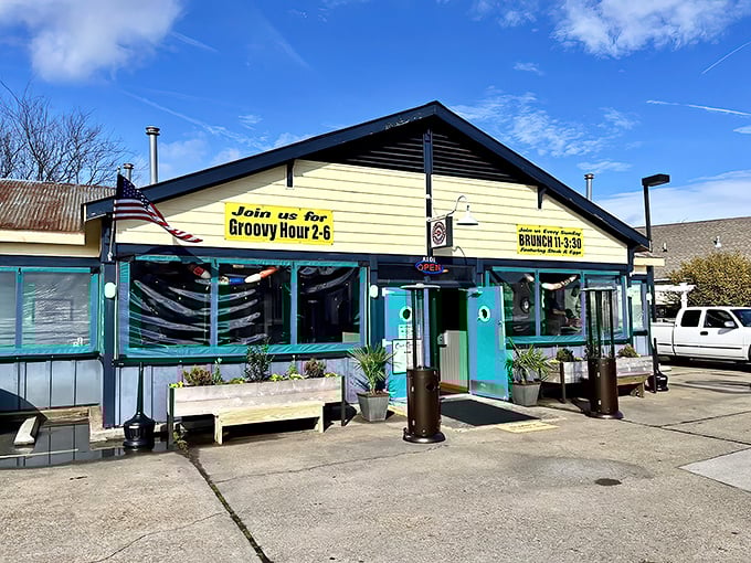 That sign isn't kidding about "Groovy Hour" – this coastal gem's exterior practically announces "good times ahead" to hungry passersby.