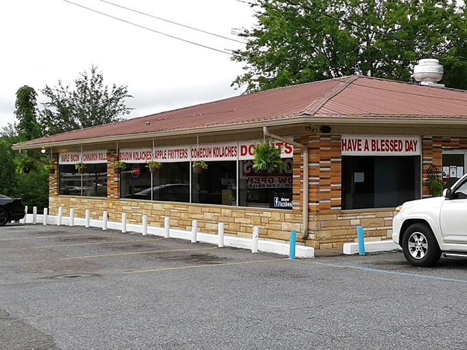 The unassuming brick exterior of Lickin' Good Donuts beckons with its cheerful "HAVE A BLESSED DAY" message—proof that culinary treasures often hide in plain sight.