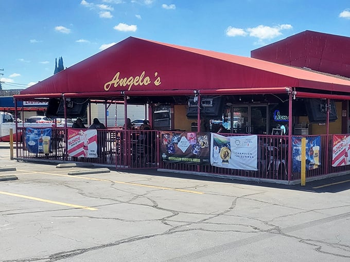 Angelo's bright crimson exterior isn't just a building—it's a landmark that's witnessed countless California families bonding over burgers for generations.