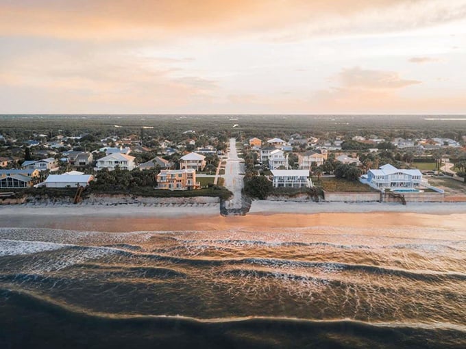Sunset paints New Smyrna Beach in golden hues, where beachfront homes line up like eager retirees at an early bird special. Paradise with postal service.