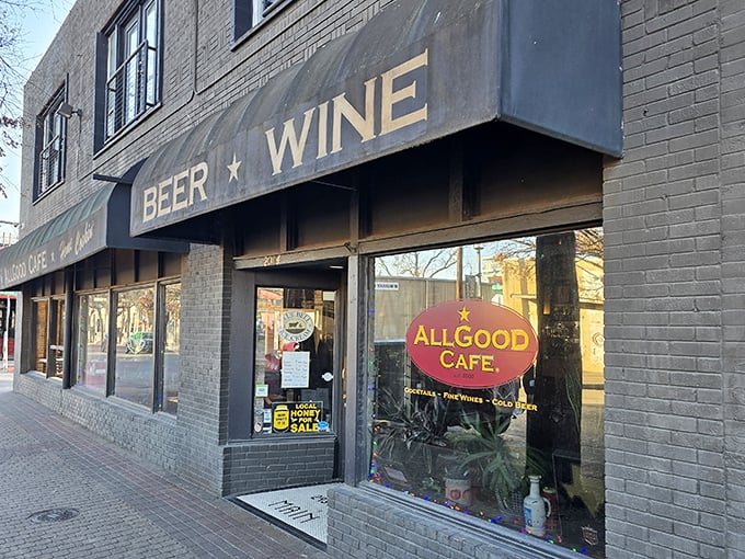 The unassuming storefront that houses culinary magic – Allgood Cafe's exterior promises what its name delivers, with "BEER ★ WINE" signage that whispers, "Stay awhile."