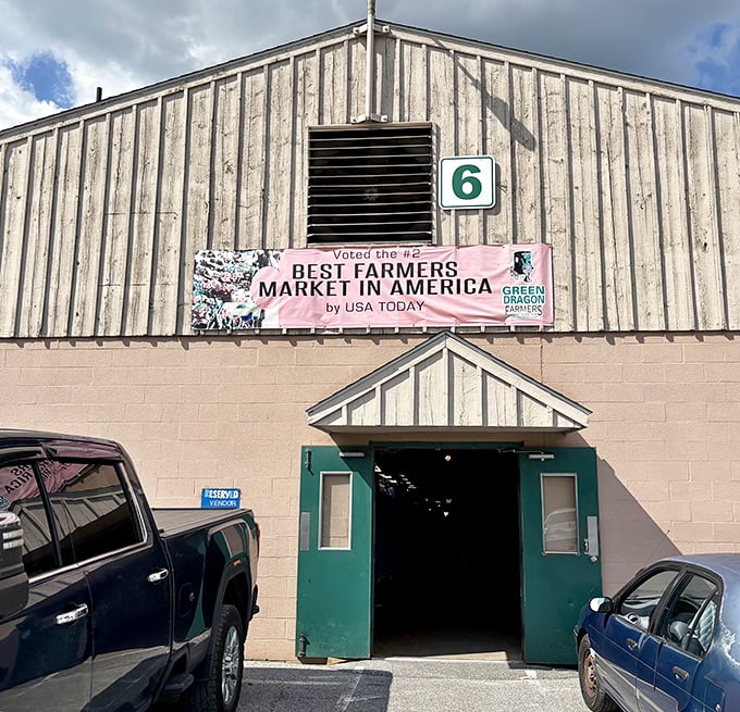 The unassuming entrance to Building 6 proudly declares its USA Today accolade—proof that sometimes the best food experiences come without fancy facades.