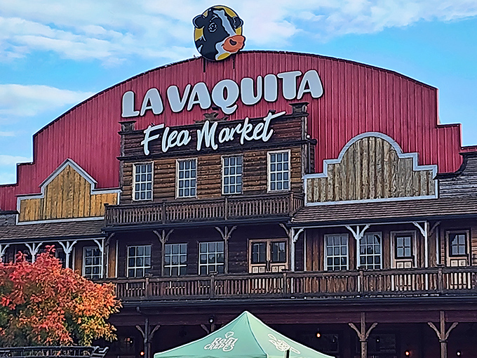 That cheerful cow perched on the roof isn't just decoration—it's your signal that shopping adventures await below.