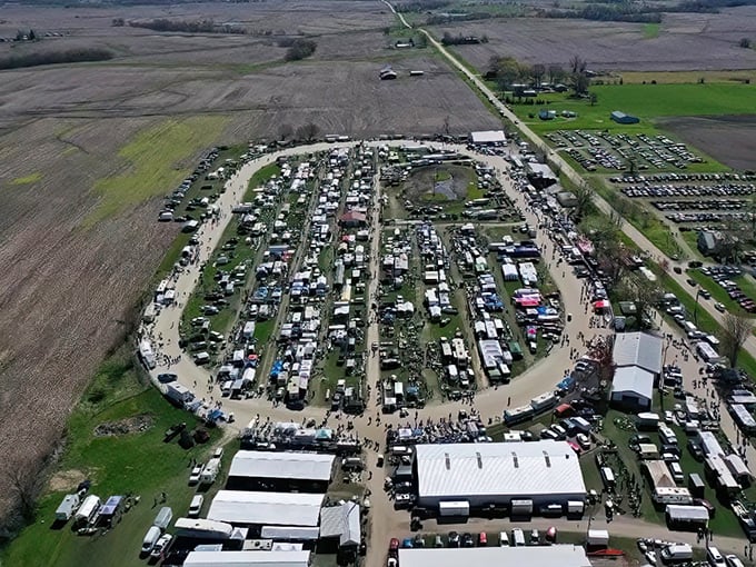 An aerial view that reveals the true scale of What Cheer Flea Market—like a small city dedicated entirely to the art of the deal.