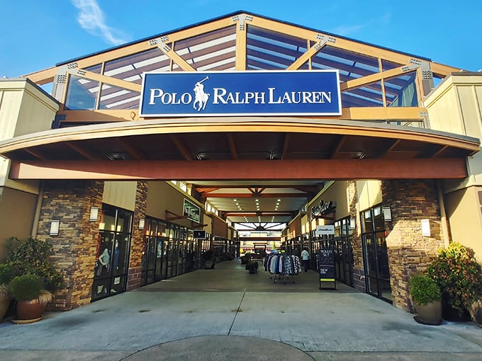 The iconic blue and white Polo Ralph Lauren sign welcomes bargain hunters to their fashion paradise. Northwest-inspired architecture adds a touch of local charm to this designer destination.