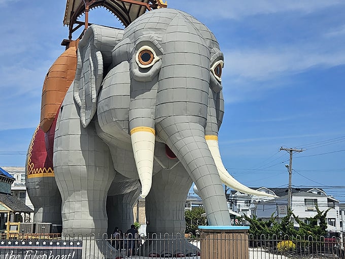 Lucy stands majestically against the Jersey sky, her six-story frame dwarfing nearby beach houses. Those tusks aren't just for show—they're architectural marvels.
