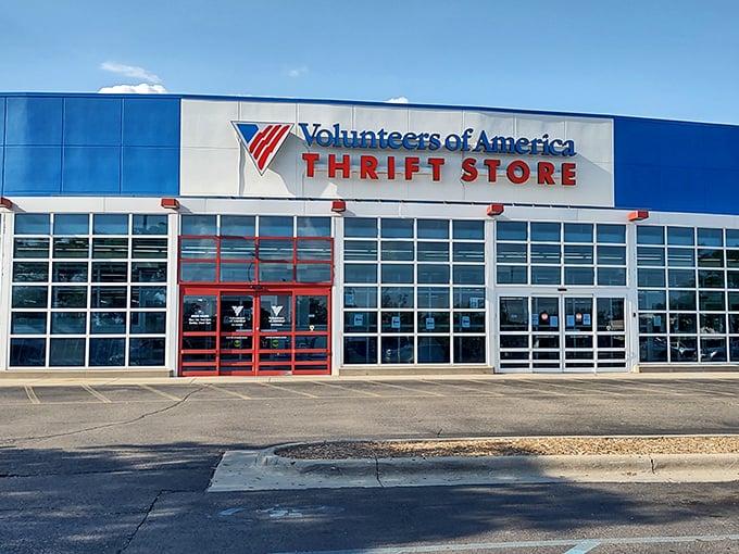 The blue and red facade of VOA Thrift Store in Westland stands like a treasure chest waiting to be opened—retail therapy without the financial hangover.