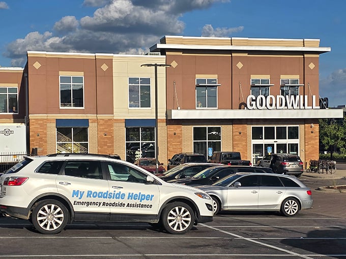 Bathed in Minnesota sunshine, this Goodwill location's distinctive architecture makes it easy to spot—much like finding that designer jacket hiding among the everyday brands inside.