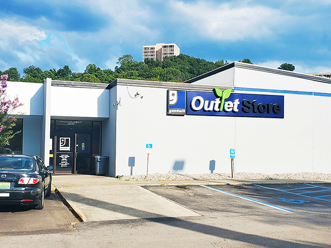 The unassuming exterior of Birmingham's Goodwill Outlet Store—like finding a treasure map disguised as a regular building.