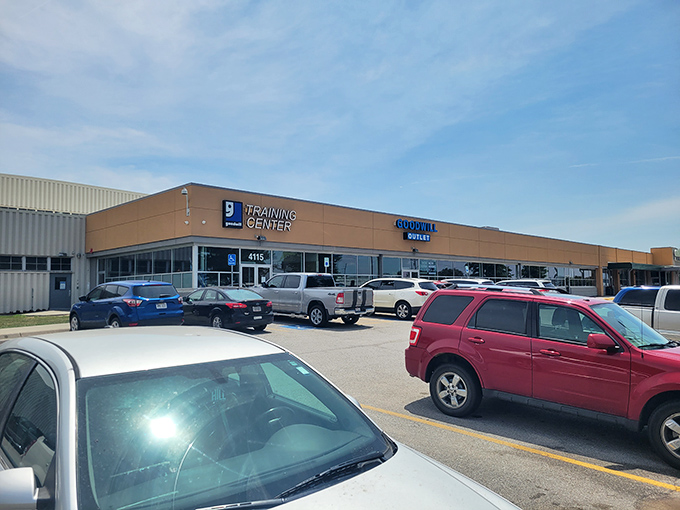 The unassuming exterior of Omaha's Goodwill Outlet belies the treasure-hunting paradise within. Like a Vegas casino, what happens inside defies the modest façade.