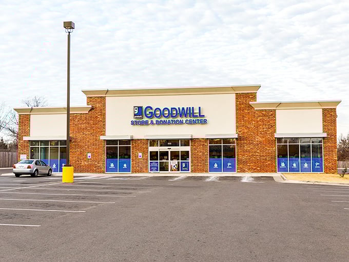 The brick-and-mortar treasure chest on MacArthur Boulevard beckons with its bold blue signage—like a portal to parallel universes where someone else's castoffs become your newfound treasures.