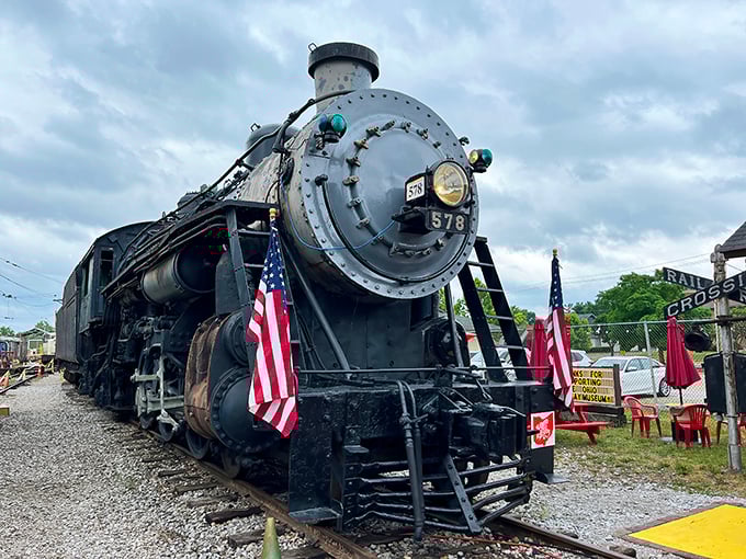 Locomotive 578 stands proudly at the Ohio Railway Museum, American flags fluttering as if to say "All aboard for history!"
