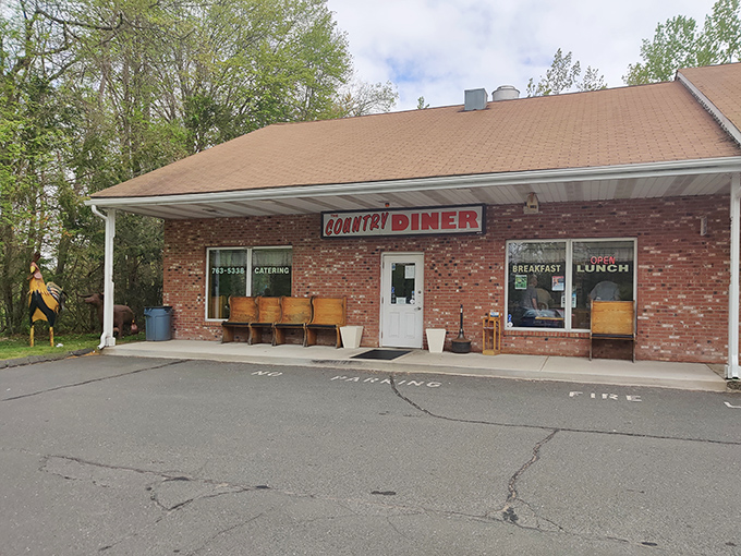 Where breakfast dreams come true! Those wooden benches outside aren't just seating – they're the waiting room for Connecticut's breakfast burrito paradise.