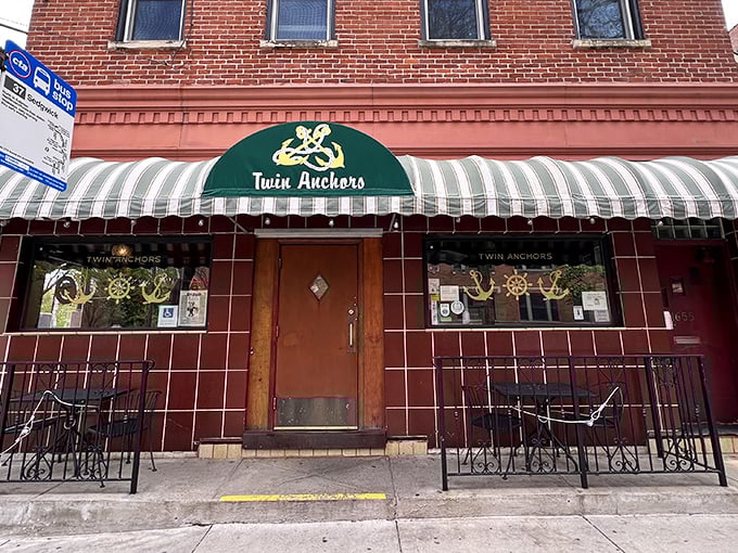 The unassuming brick facade of Twin Anchors hides a culinary time machine. That green awning has welcomed hungry Chicagoans through countless seasons of Cubs disappointment and celebration.